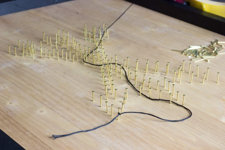 How to Make String Art {DIY Arrow Art} - Erin Spain