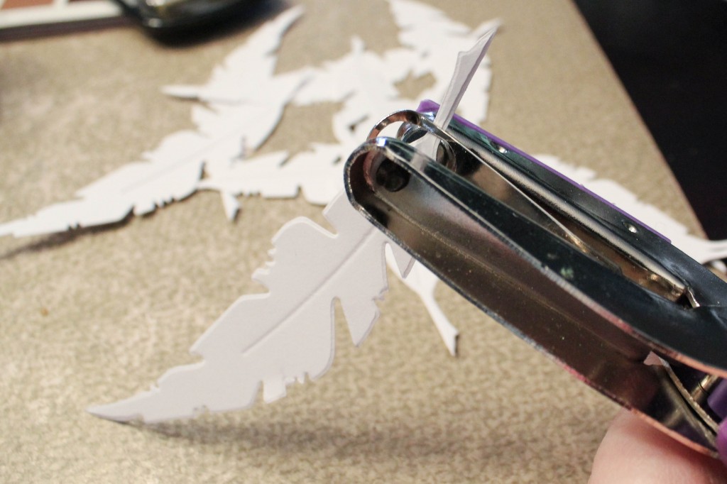 DIY Paper Feather Ornaments - Erin Spain